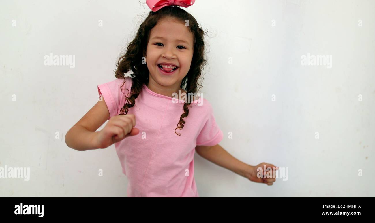Small little girl child dancing Stock Photo - Alamy