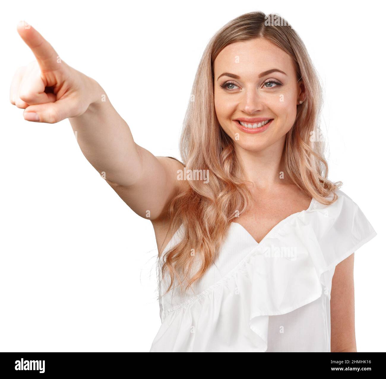 Young woman pointing at your product isolated on white background Stock ...