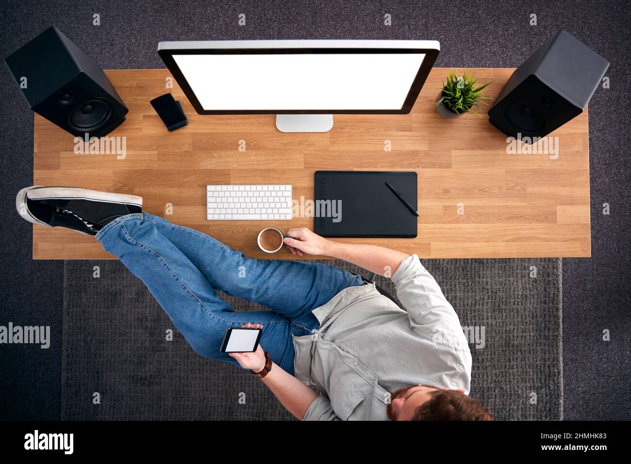 Feet on desk hi-res stock photography and images - Alamy