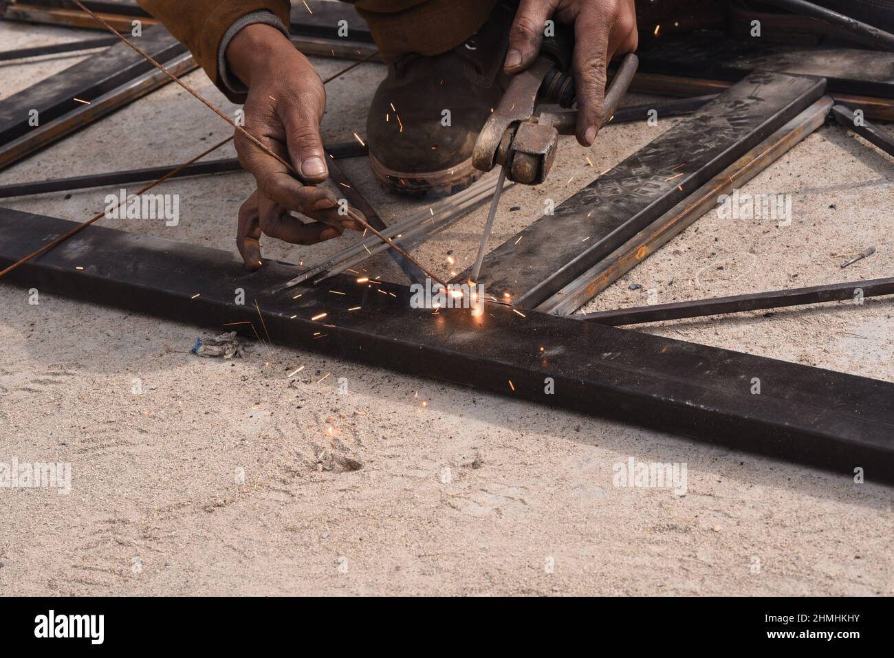 Metal processing with angle grinder. Sparks in metalworking Stock Photo ...