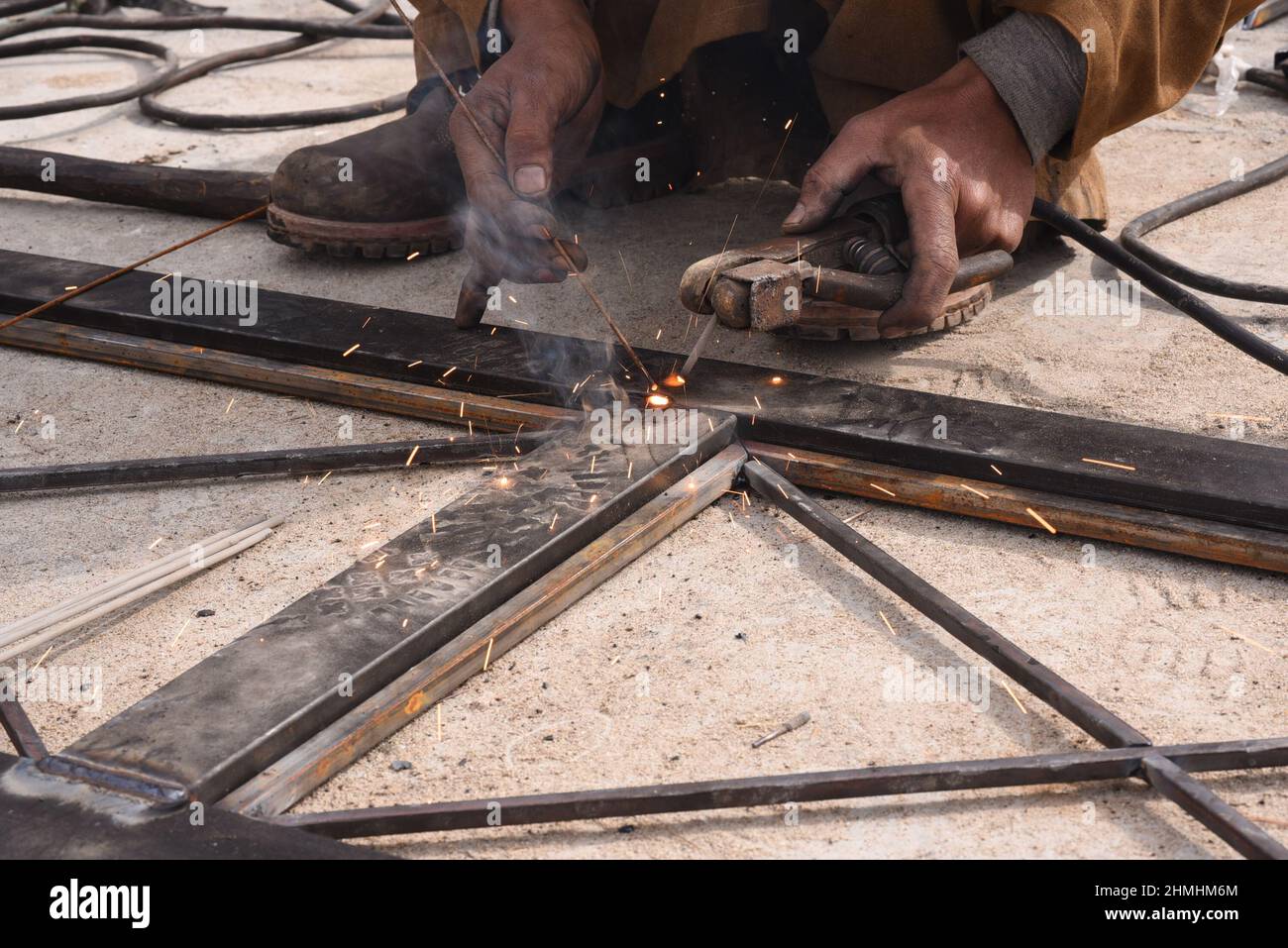 Metal processing with angle grinder. Sparks in metalworking Stock Photo ...