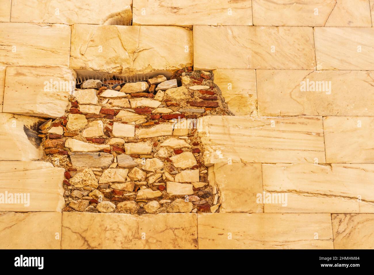 Details and texture of broken damaged marble walls and columns of the ...