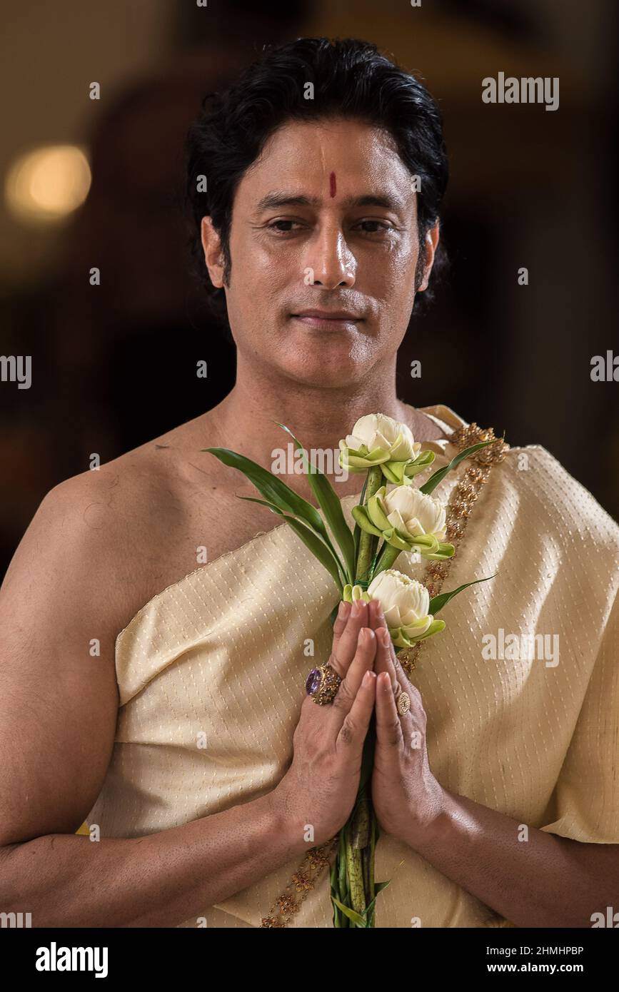 Mr. Gagan Malik, an Indian actor seen pays respect before the Buddhist ...