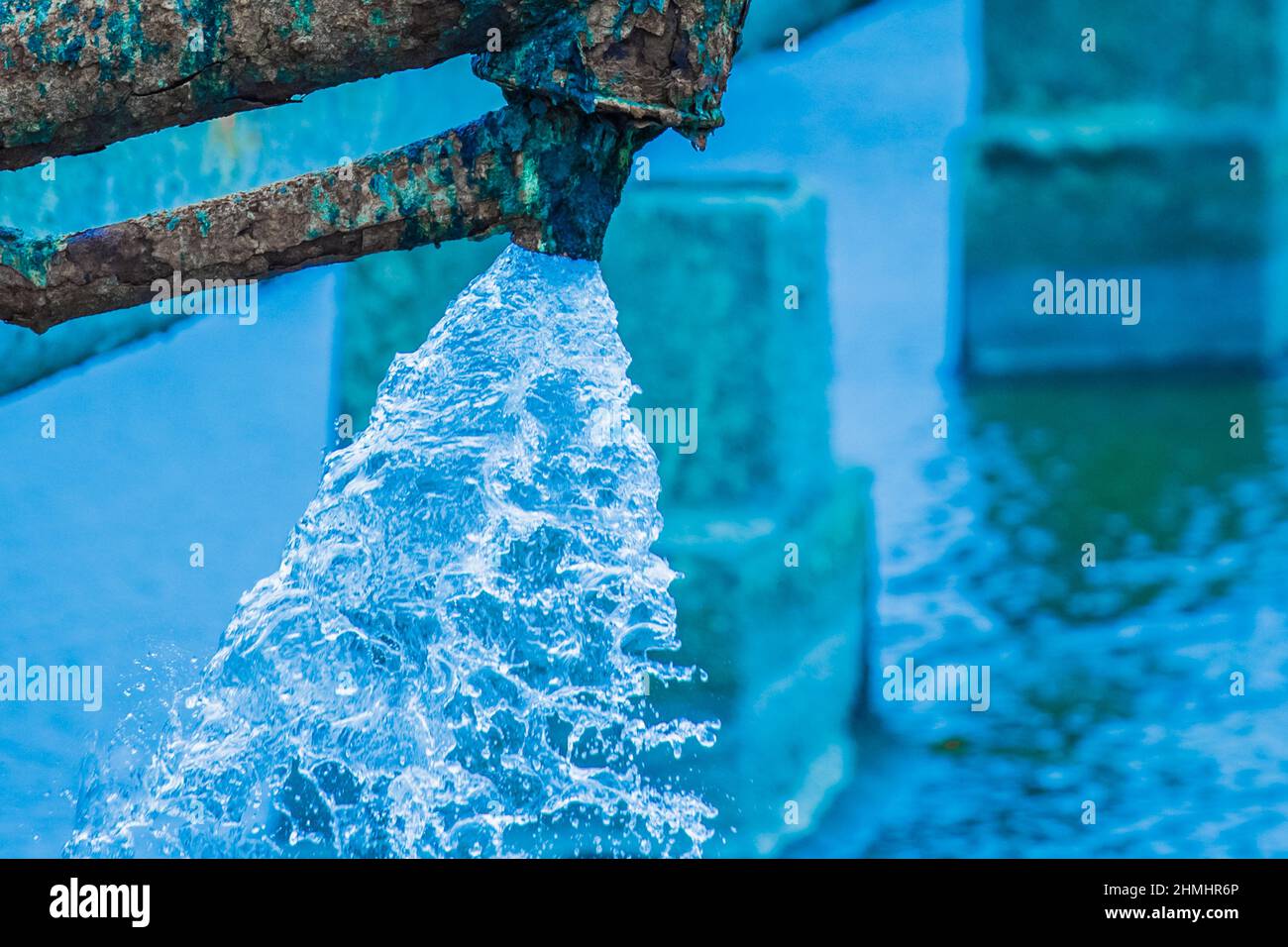 Old steel rusty pipes of the water cooling pipeline system of the ...