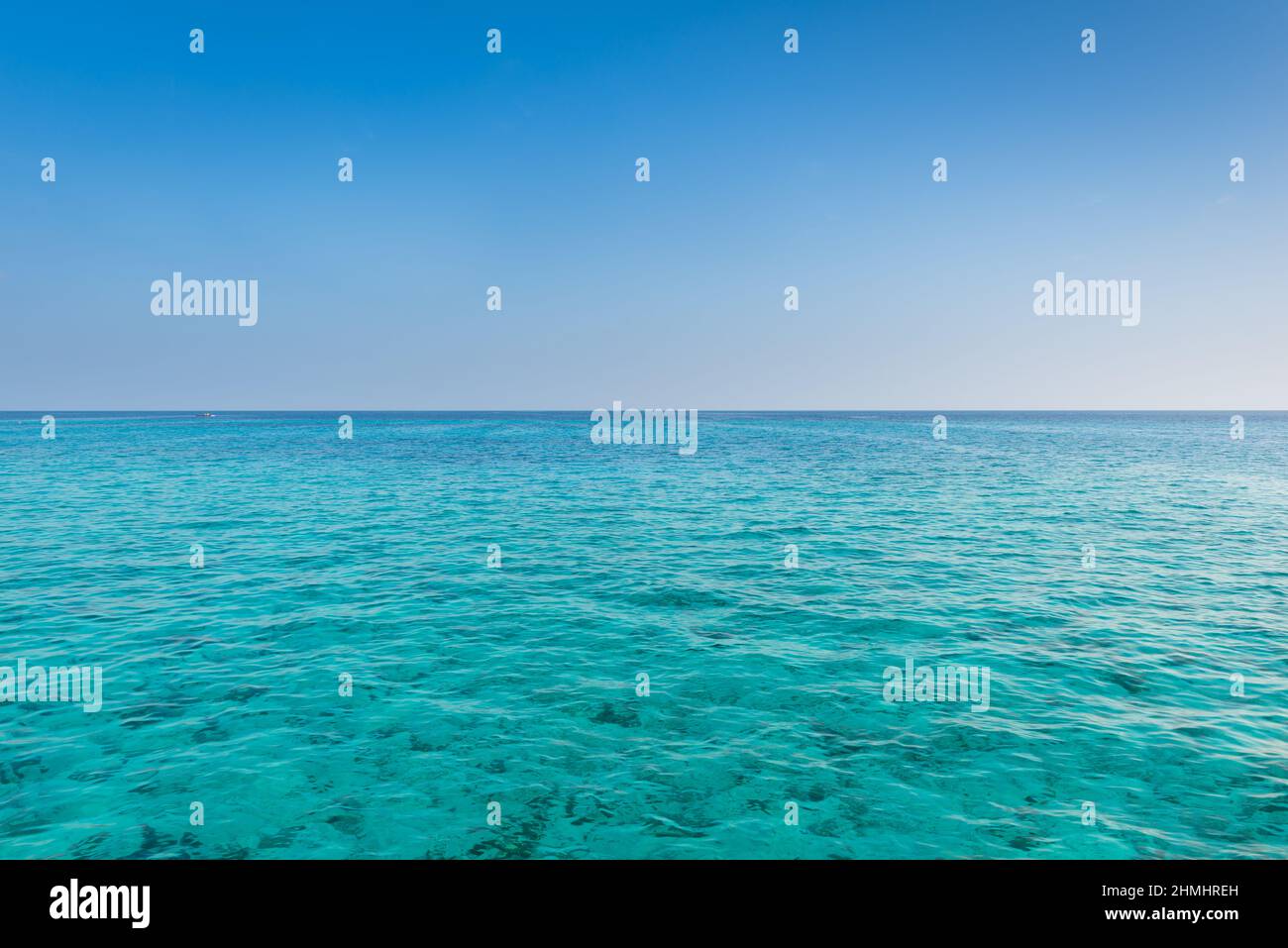 Turquoise water lagoon in the ocean. Coral reefs of the tropical island ...