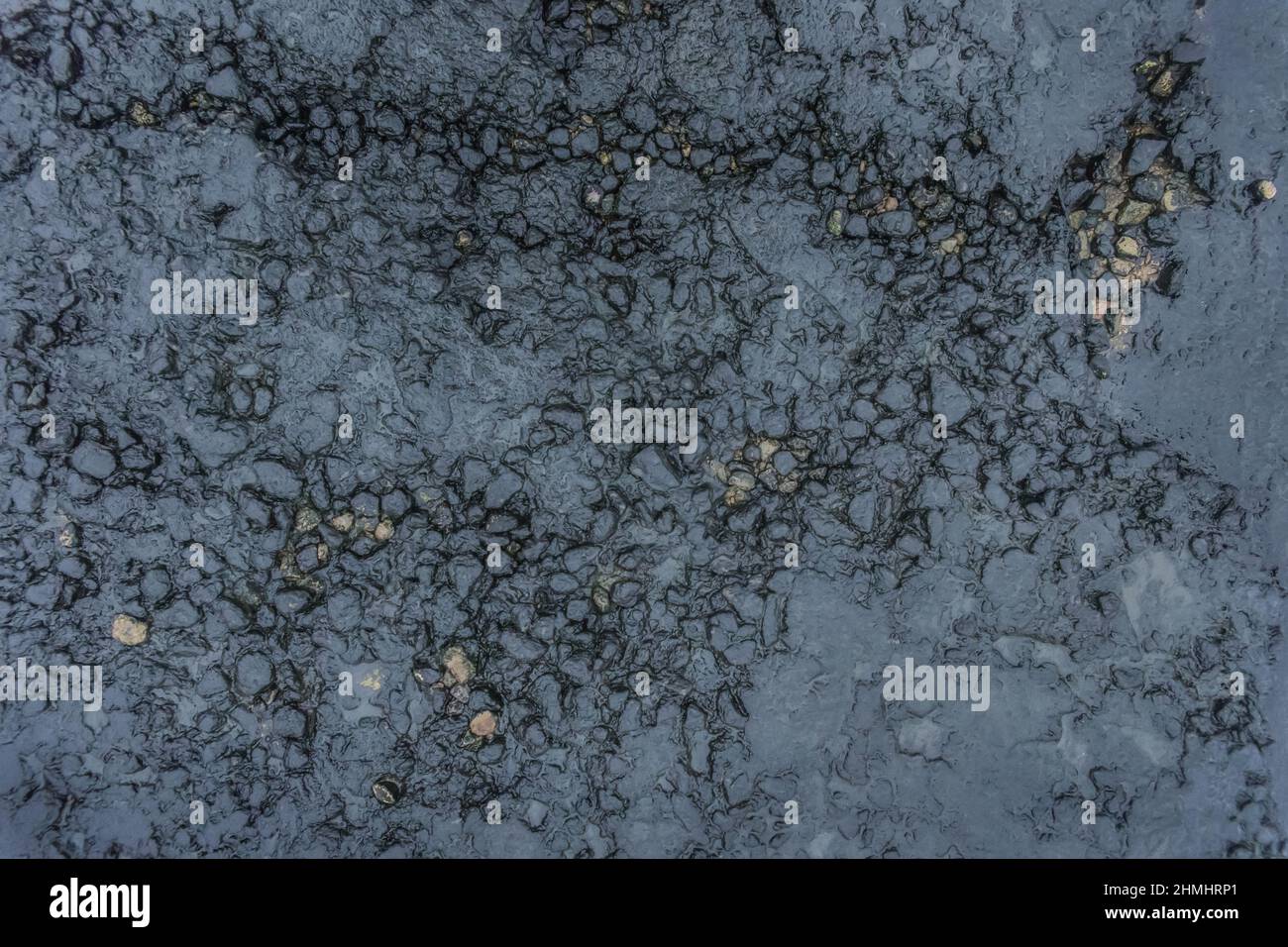 Fuel pollution soil dirt oil blue rough stone surface of the earth ...