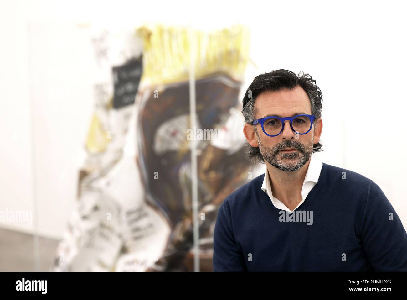 Duesseldorf, Germany. 10th Feb, 2022. Artist Niclas Castello sits in ...