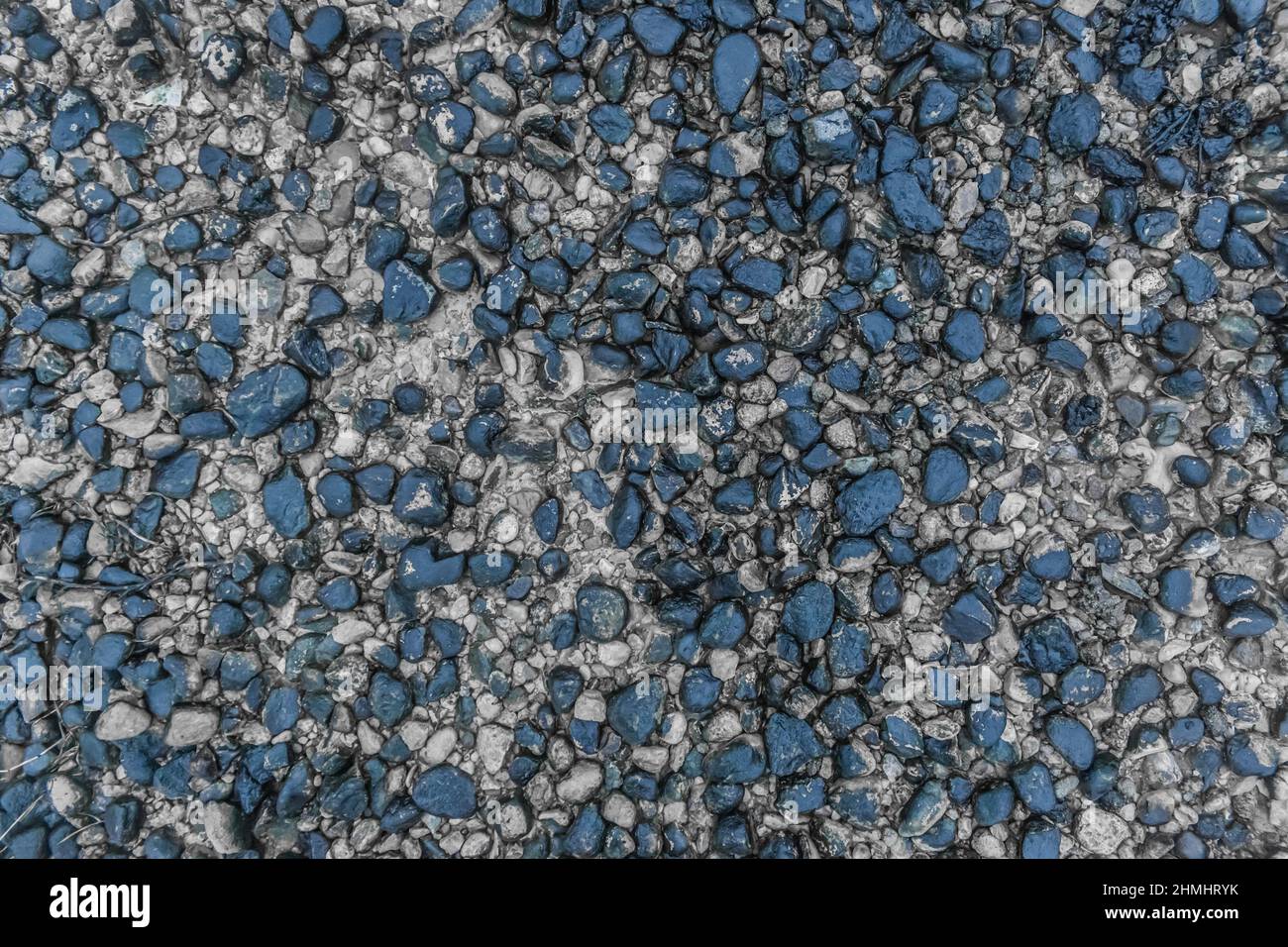 Pebbles dark blue river stone natural background shore surface rough ...