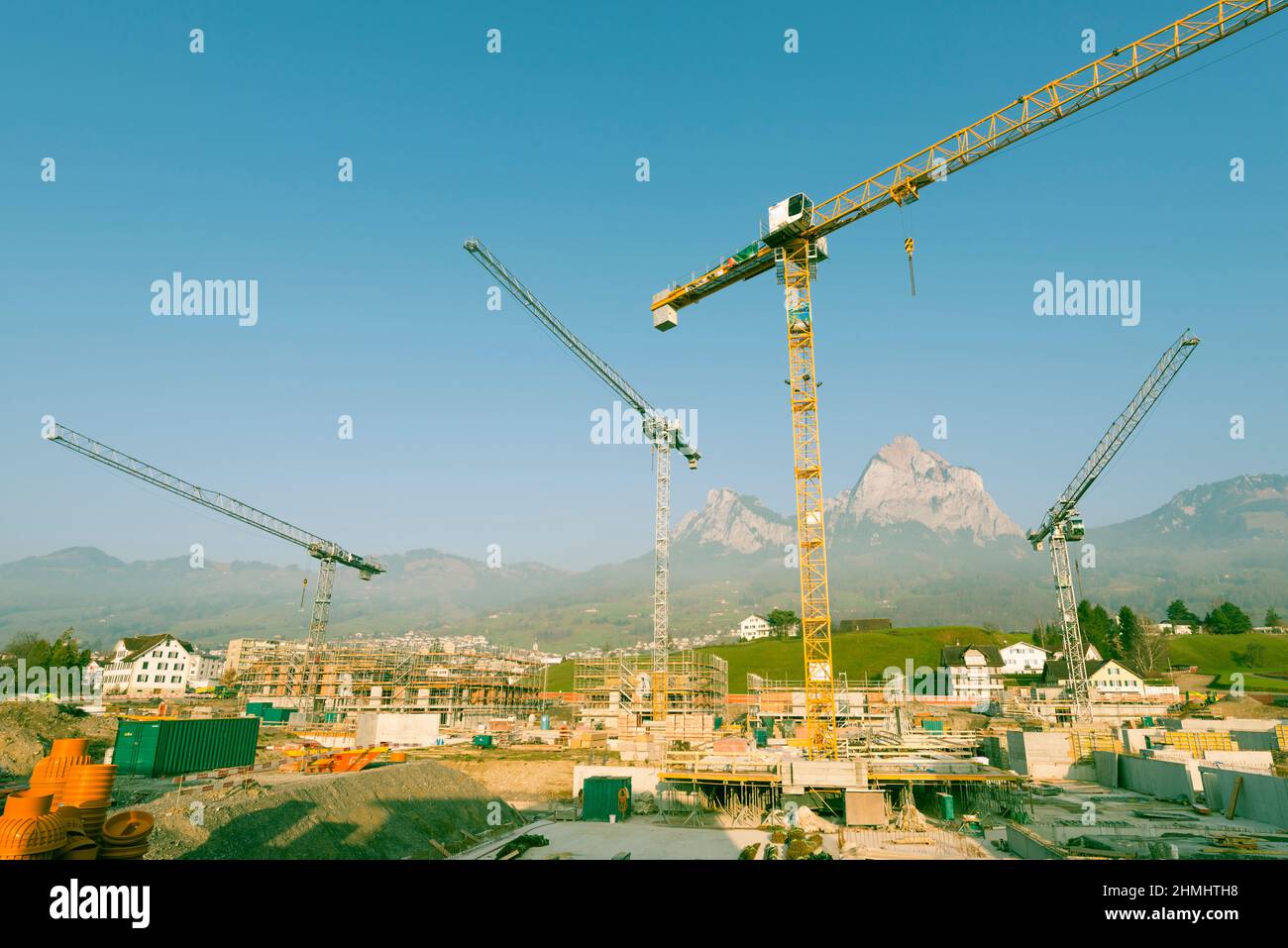 Cranes at the construction site. Color abstraction Stock Photo - Alamy