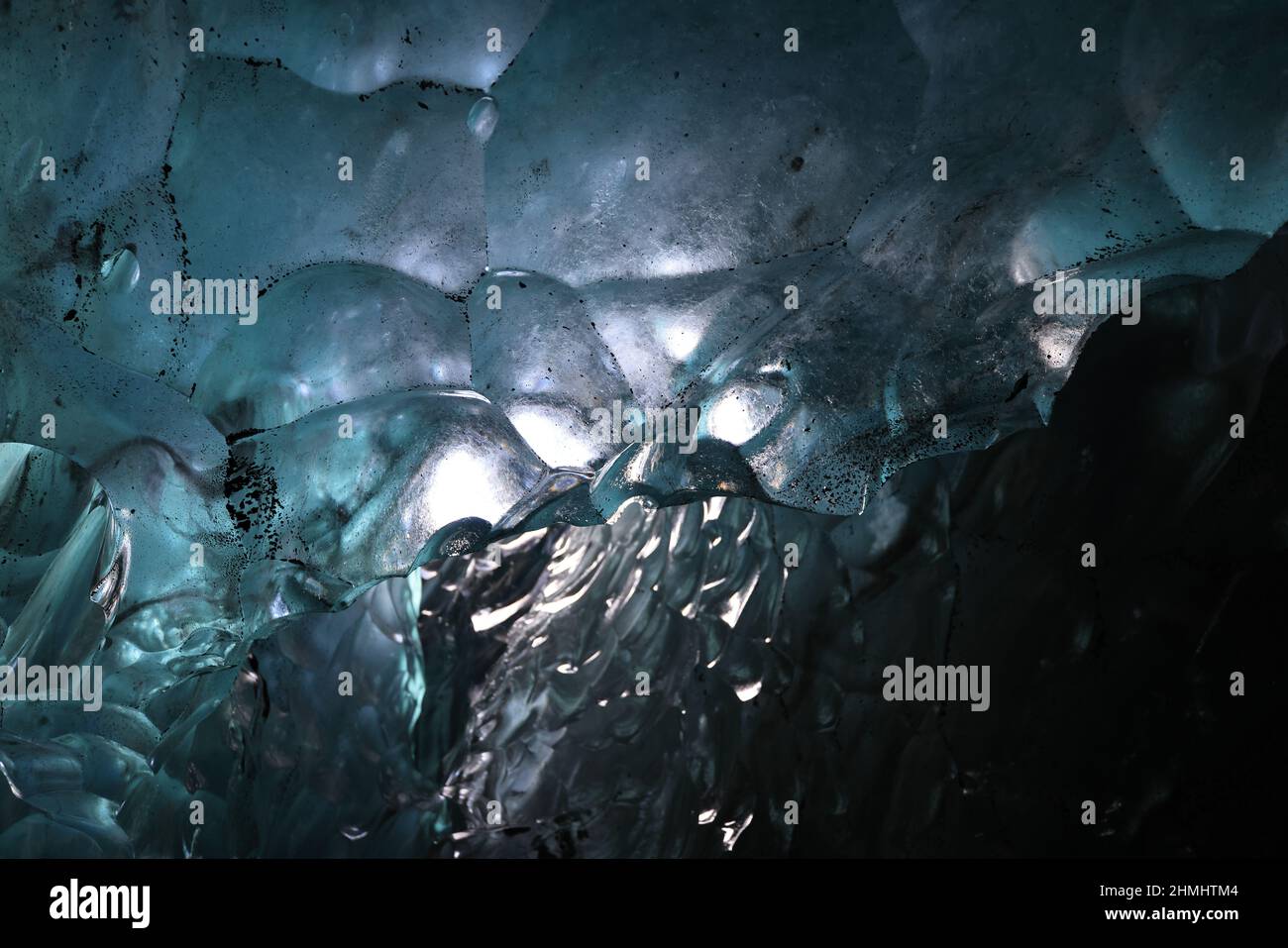 Ice cave at the northern shore of glacial lagoon Joekulsarlon in ...