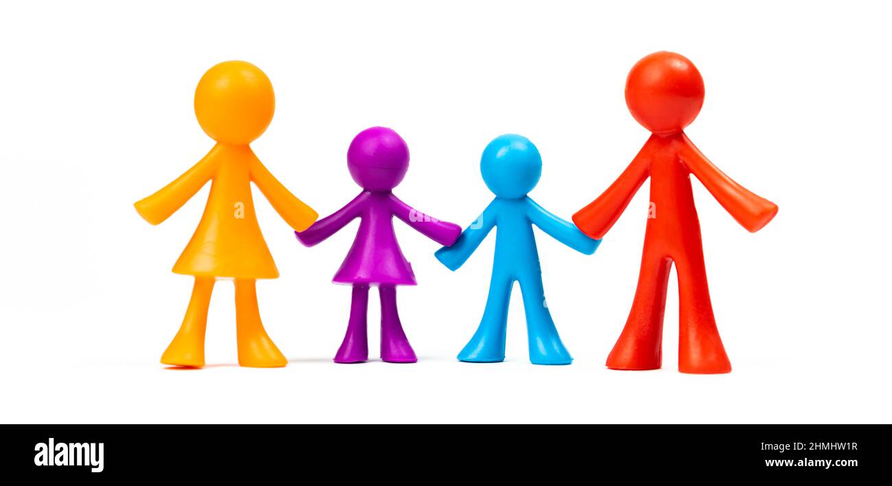 Figurines of the family stand on white isolated background. Concept of ...