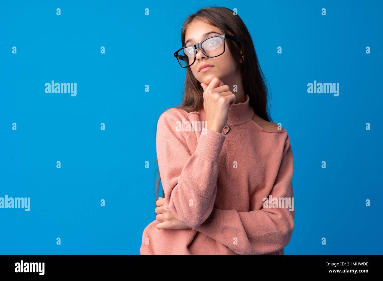 Portrait of pretty teen girl thinking and creating solution against ...