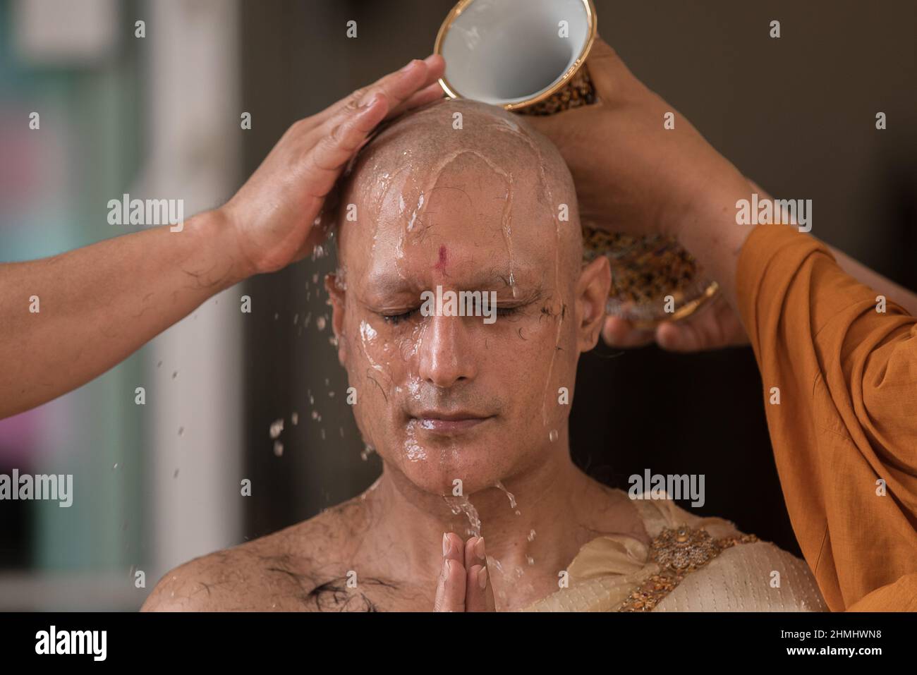 Bangkok, Thailand. 10th Feb, 2022. Buddhist monks wash Indian actor ...