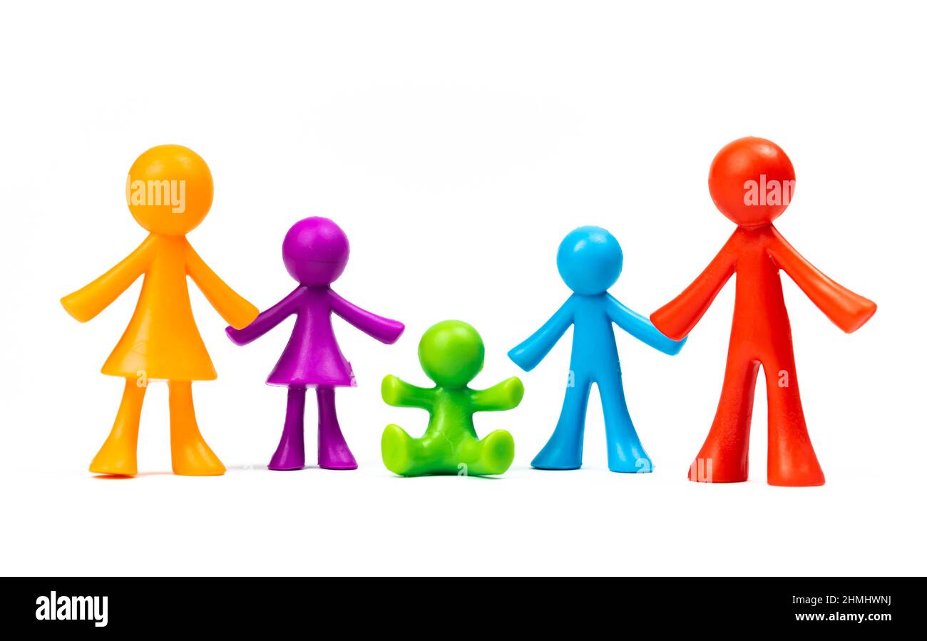 Figurines of the family stand on white isolated background. Concept of ...