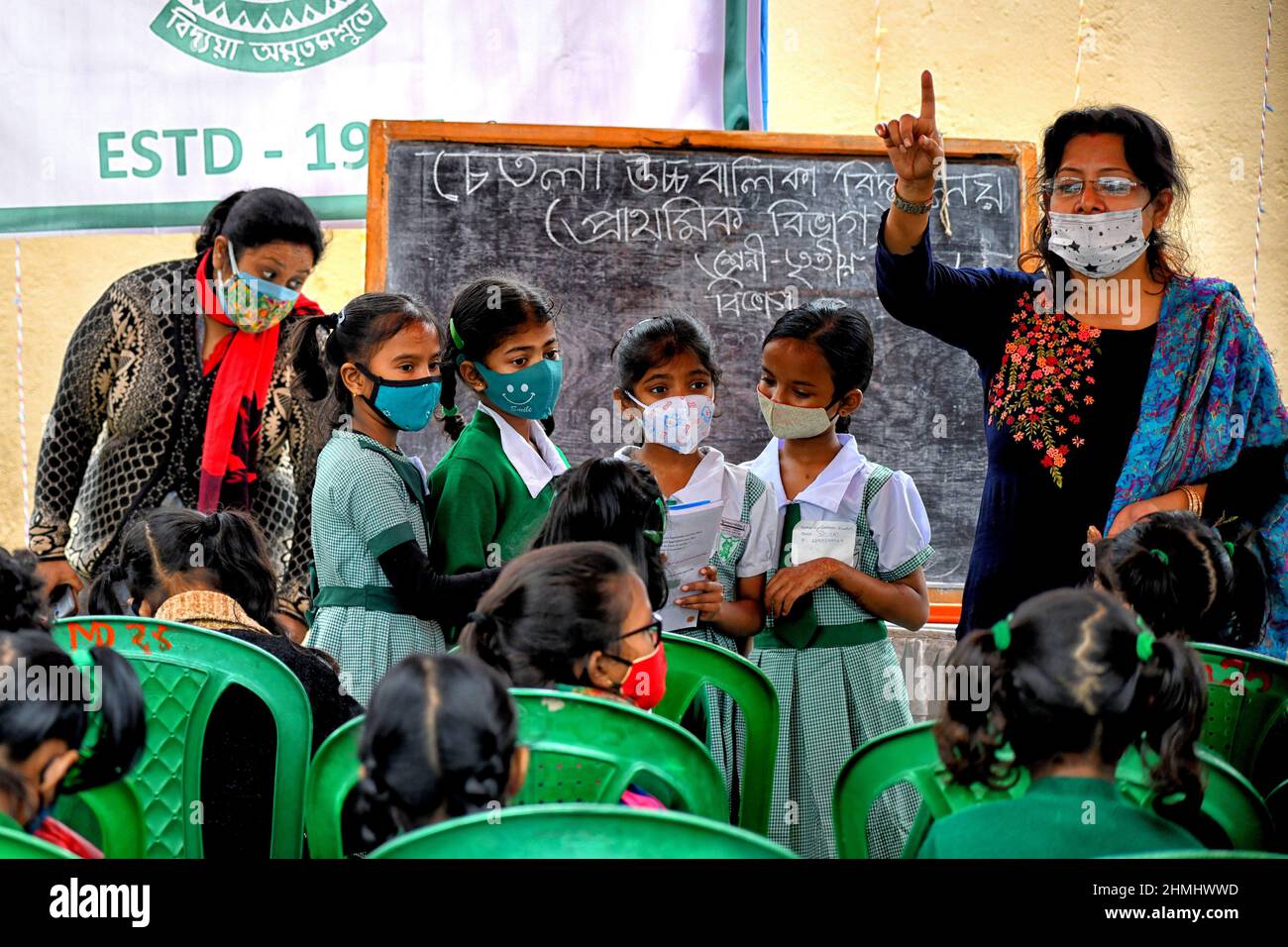 Kolkata, India. 10th Feb, 2022. Teachers seen teaching students during ...