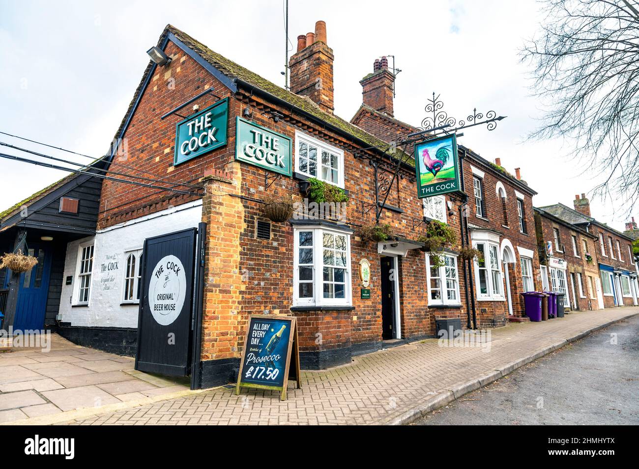 Exterior of 17th century The Cock pub in Baldock, Hertfordshire, UK Stock Photo - Alamy