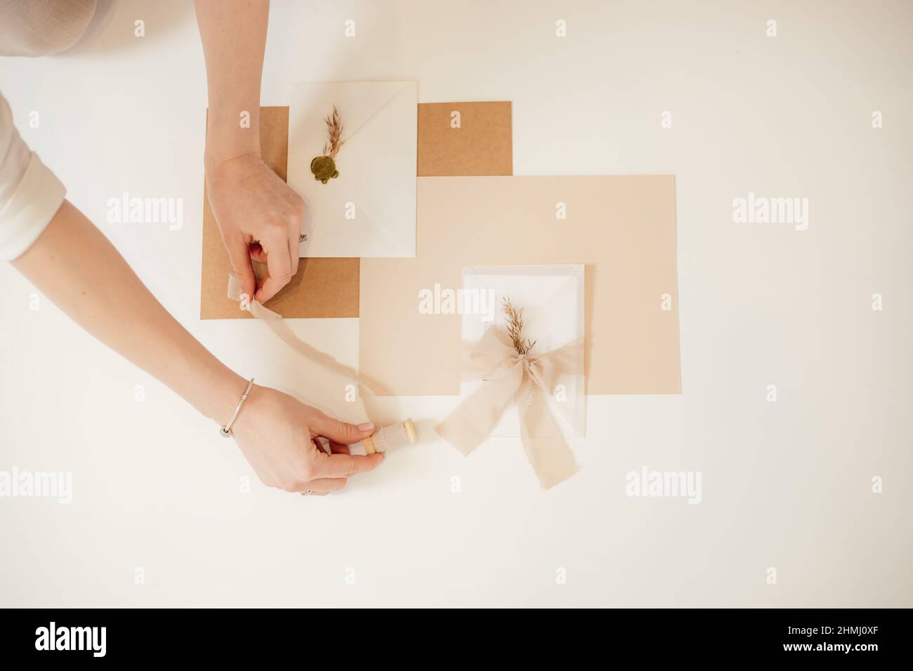 Hand out envelope hands hi-res stock photography and images - Alamy