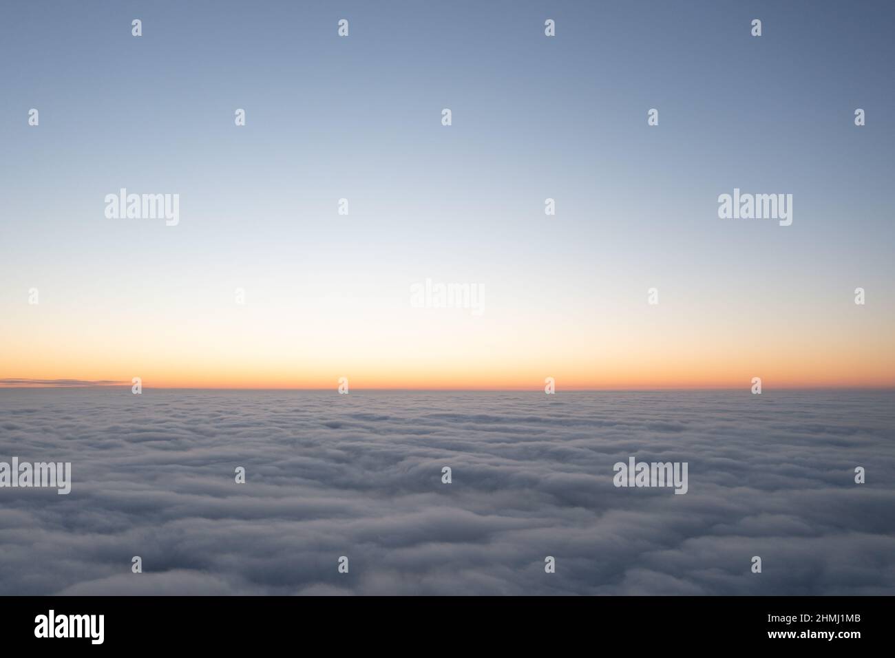 Sunrise high above the clouds. Bright colored morning sky Stock Photo - Alamy