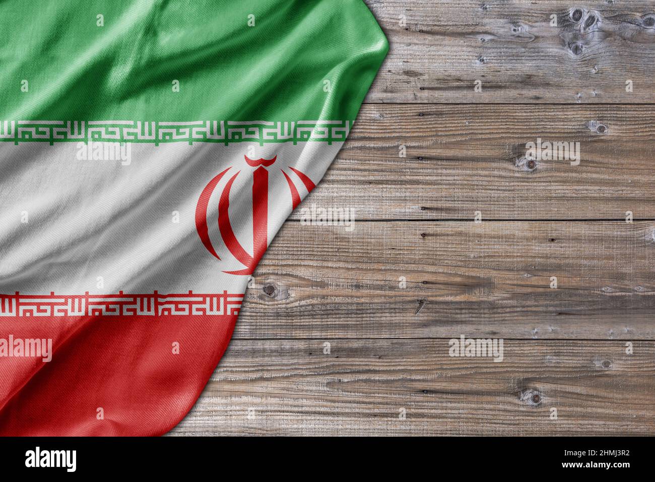Wooden pattern old nature table board with Iran flag Stock Photo - Alamy