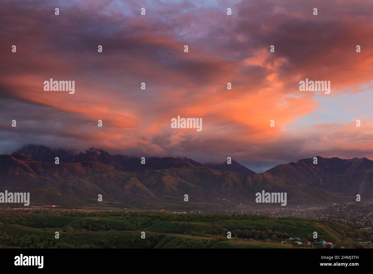 Sunset over the city of Talgar. View from the surrounding hills Stock ...