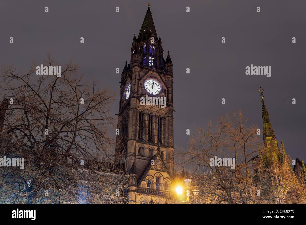 Manchester, UK night view of City Council iconic tower at midnight ...