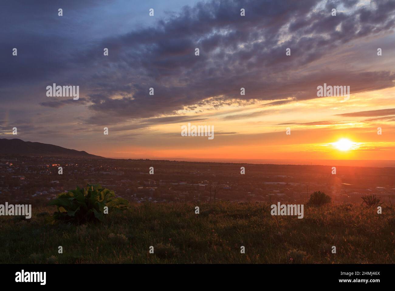 Sunset over the city of Talgar. View from the surrounding hills Stock ...