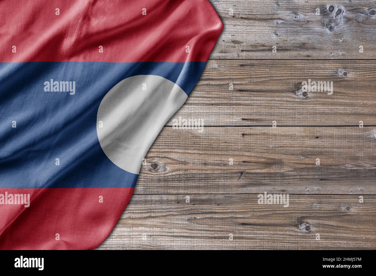 Wooden pattern old nature table board with Laos flag Stock Photo - Alamy