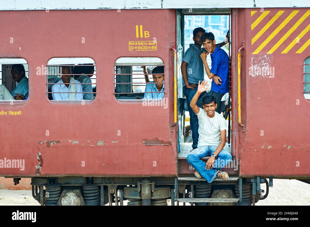 India Rajasthan. Passengers on a third class train Stock Photo - Alamy