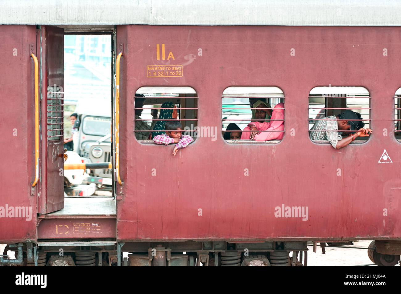 India Rajasthan. Passengers on a third class train Stock Photo - Alamy