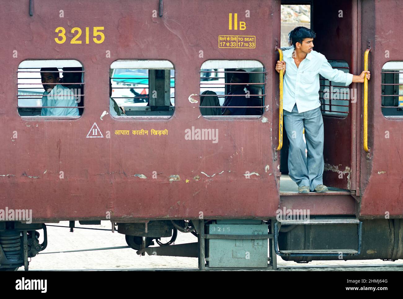 India Rajasthan. Passengers on a third class train Stock Photo - Alamy