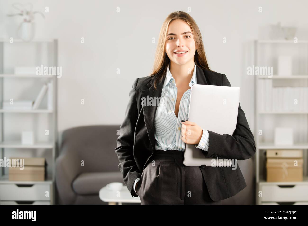 Portrait of young businesswoman accountant in formal wear at office ...