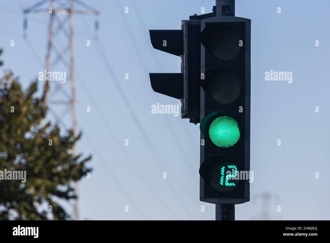 Traffic lights over urban intersection. Green light Stock Photo - Alamy