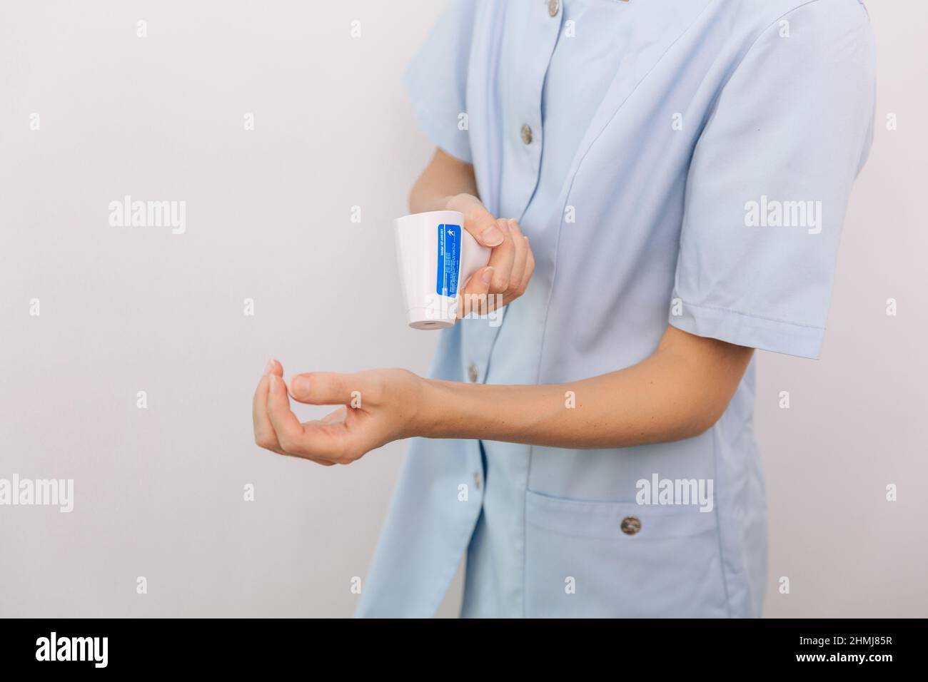 Temperature measurement gun in doctor hands. Close-up shot of doctor ...