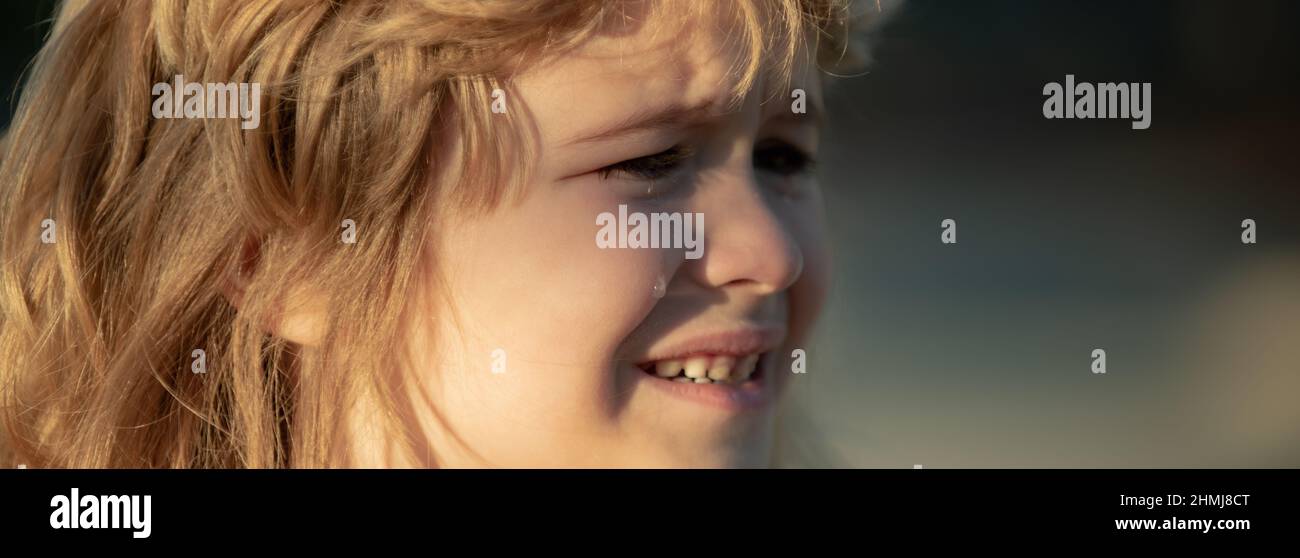 Closeup face of child boy crying outdoor. Tears on kids face closeup ...