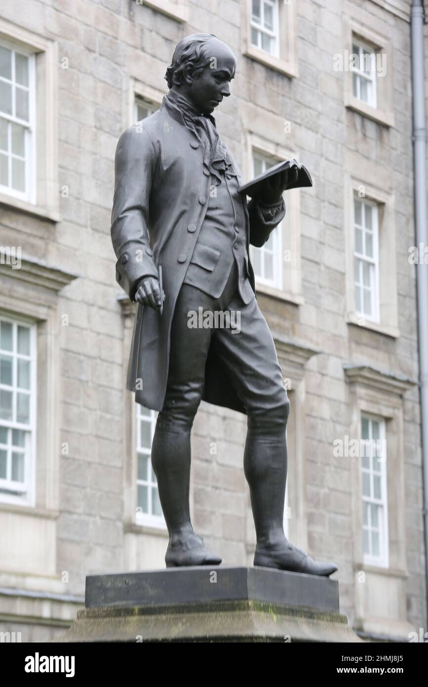 A statue of Oliver Goldsmith at Trinity College Stock Photo - Alamy