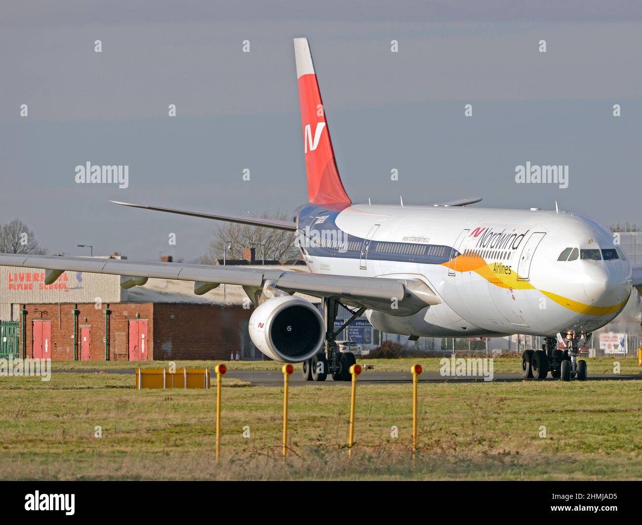 NORDWIND AIRLINES' AIRBUS A330-300 series taxiing out to runway 27 at ...