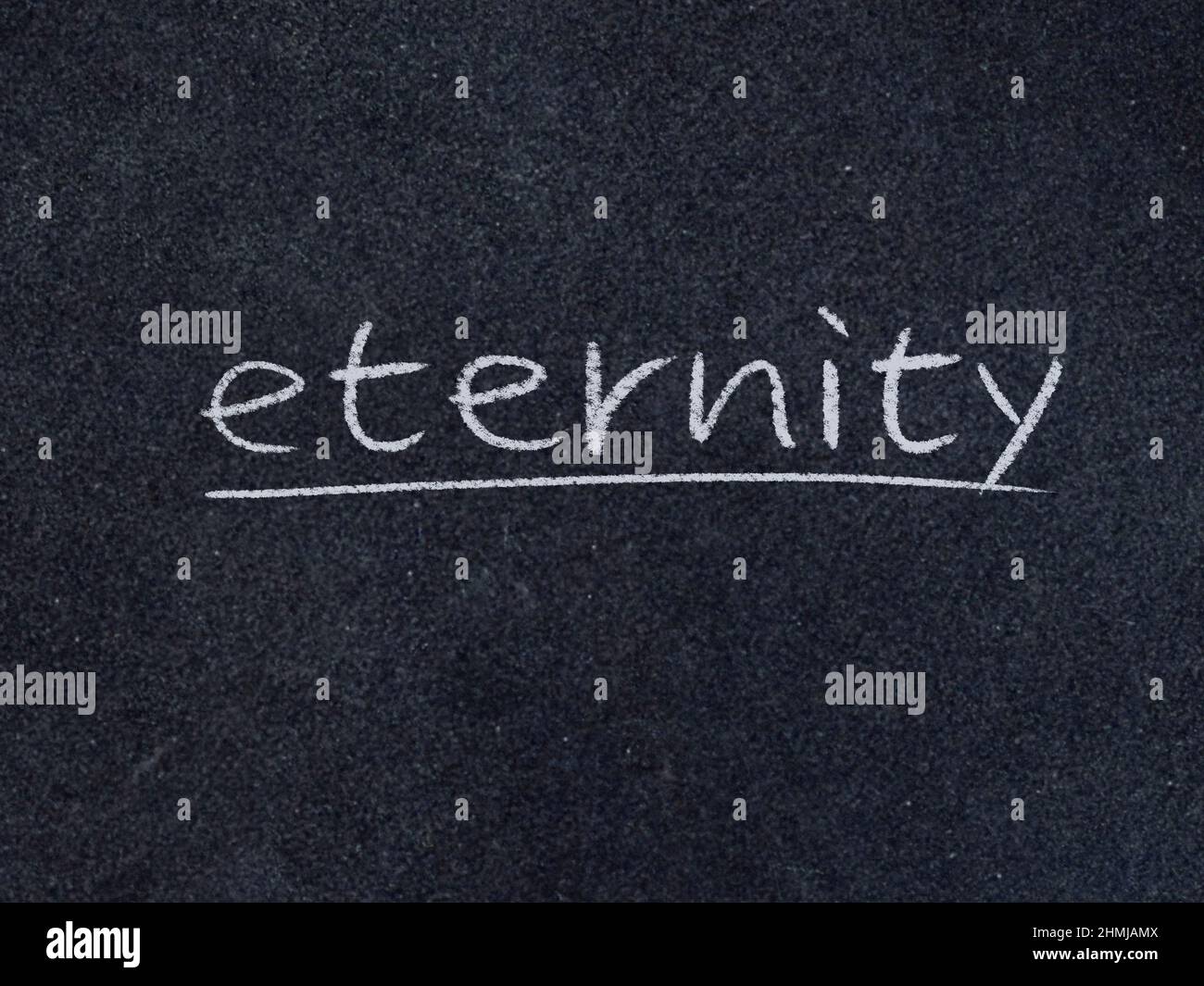 eternity concept word on blackboard background Stock Photo - Alamy