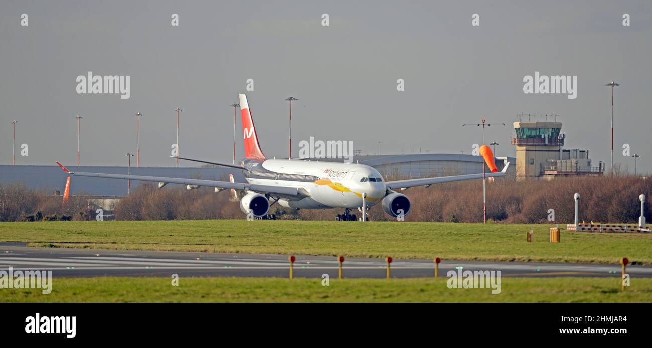 NORDWIND AIRLINES' AIRBUS A330-300 series taxiing out to runway 27 at ...