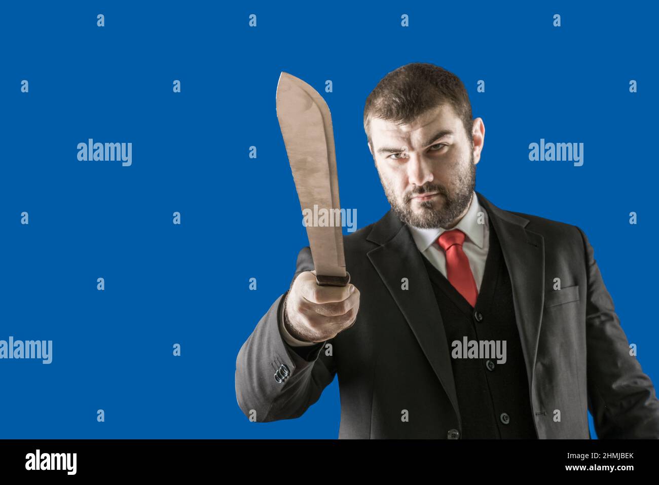 The killer swings at his victim. Dangerous man. Threat to life. The ...