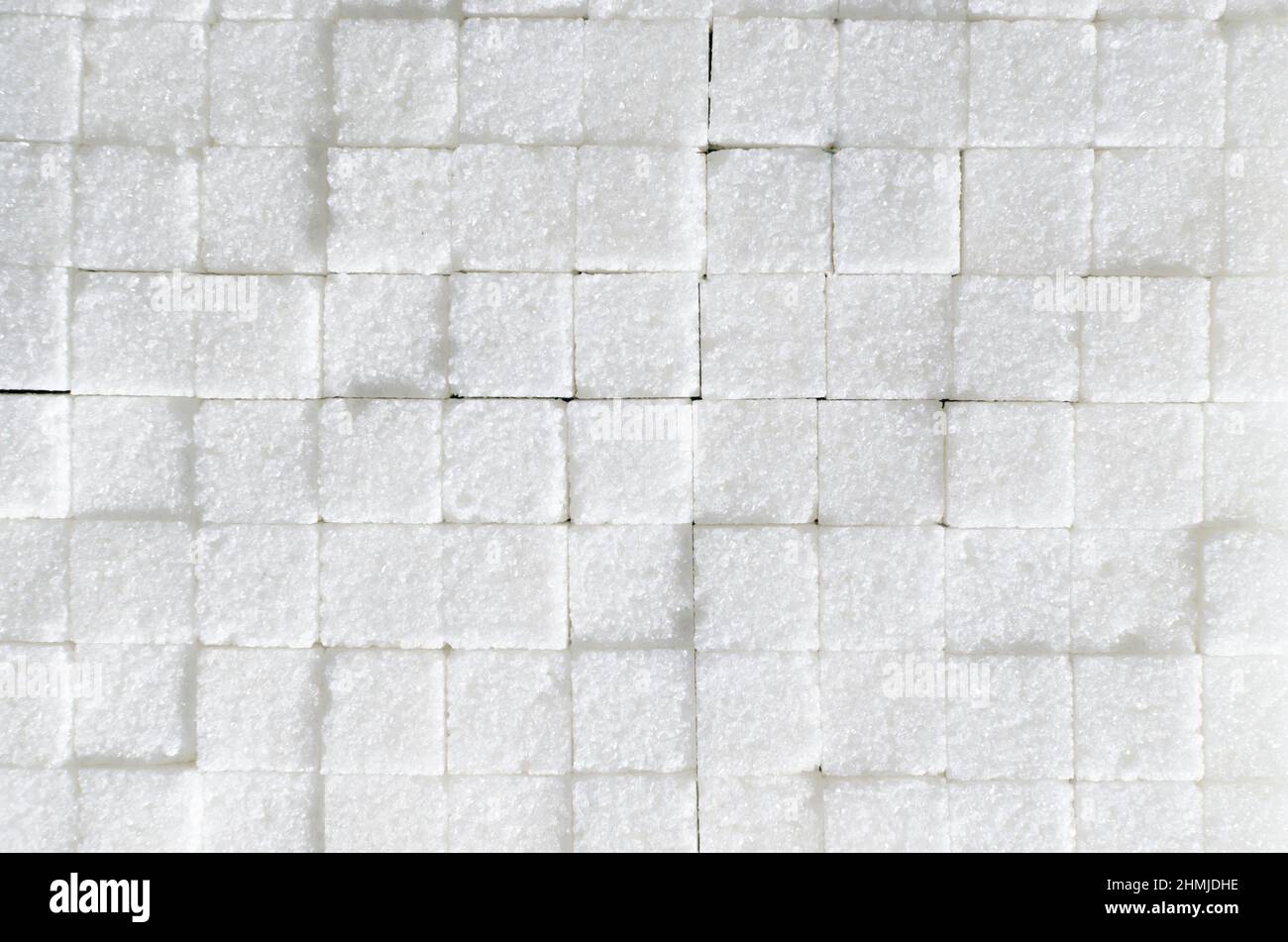 Background of refined sugar cubes.Sweet ingredient, food Stock Photo ...