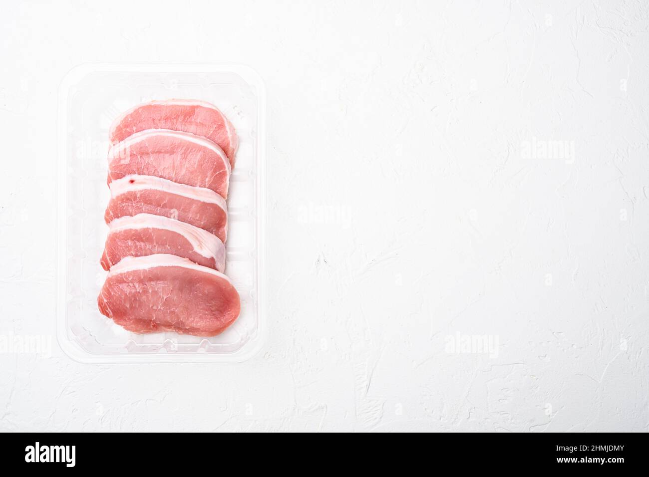 Raw organic meat. Pork steaks, fillets for grilling, baking or frying ...