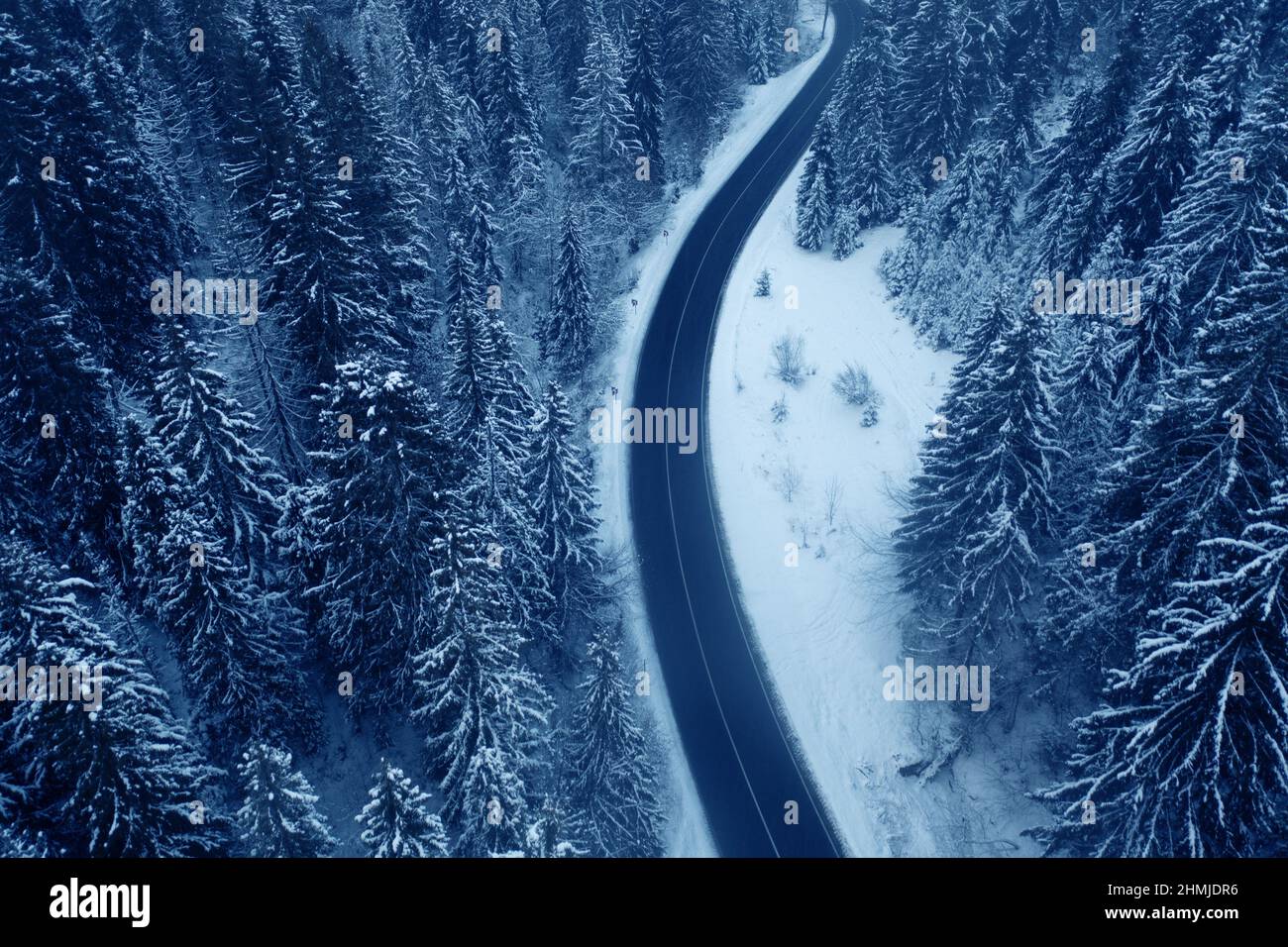 Aerial view of a curved mountain road Aerial view of a curved mountain ...