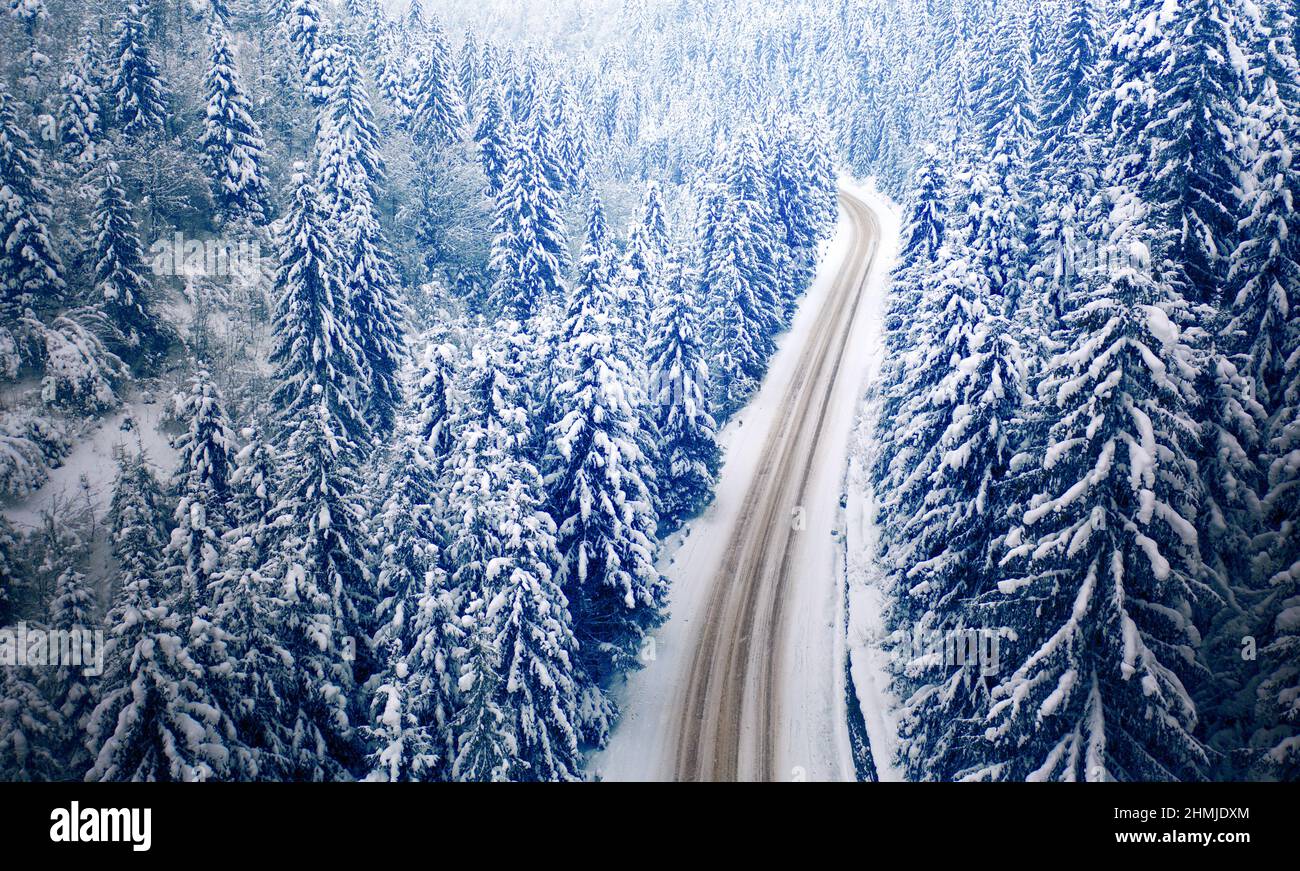 Aerial view of a curved mountain road Aerial view of a curved mountain ...