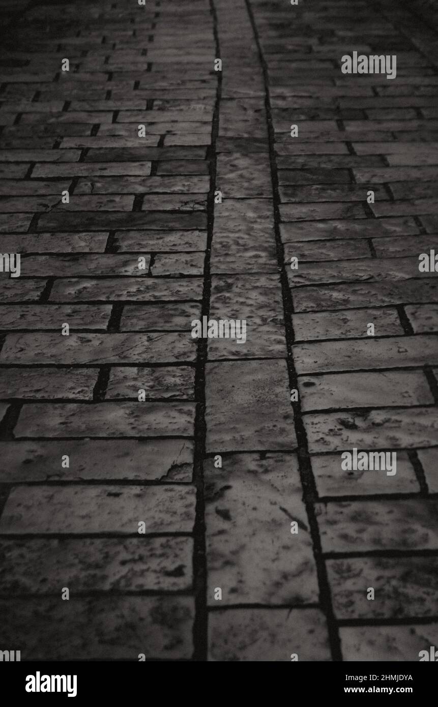 Ancient stone blocks of the old town.Pedestrian road Stock Photo - Alamy