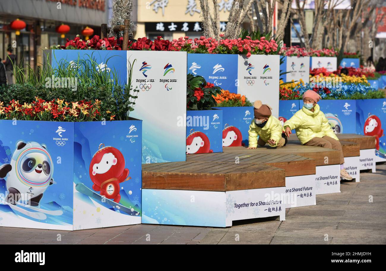 Beijing, China. 10th Feb, 2022. Posters of "Bing Dwen Dwen" and "Shuey Rhon Rhon" the mascots of ...