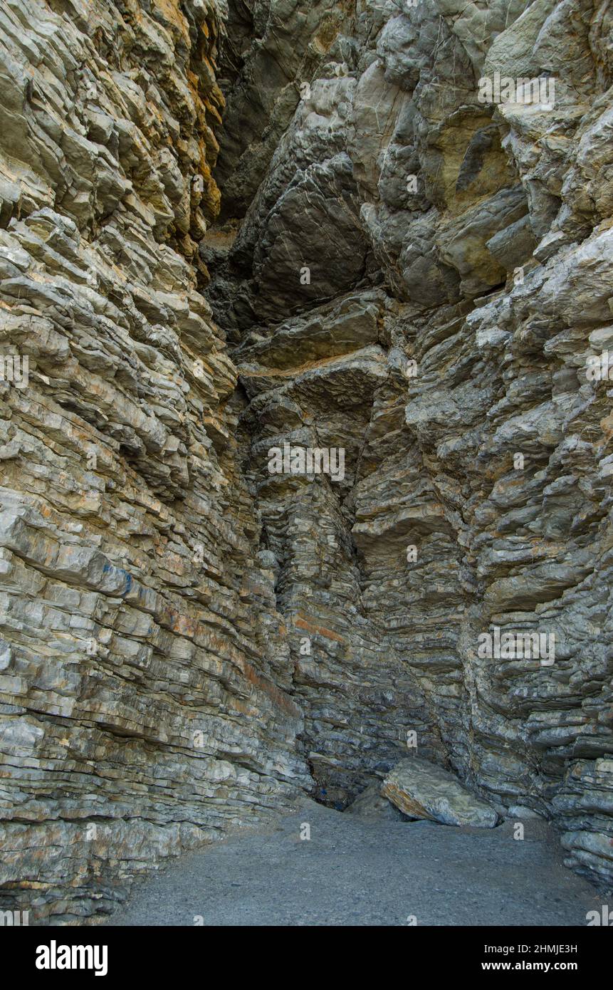 Rock, the background of the layers of ancient sediments.Layered stone ...