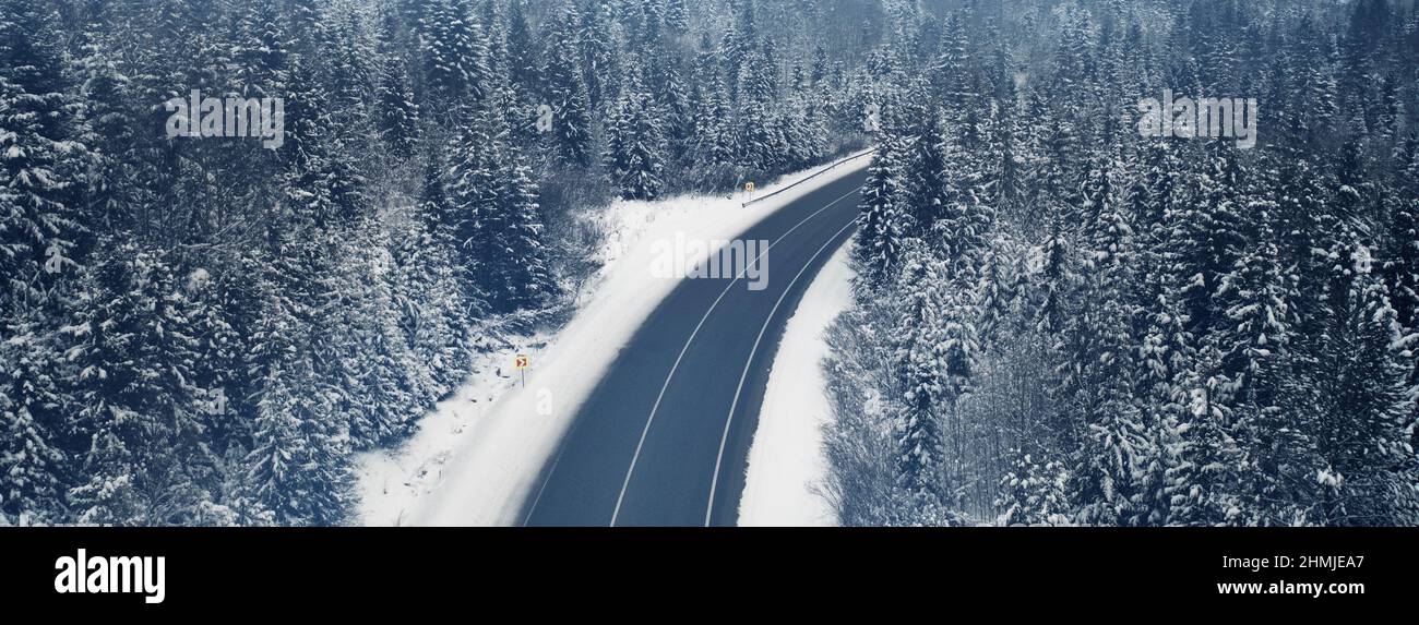 Aerial view of a curved mountain road Aerial view of a curved mountain ...