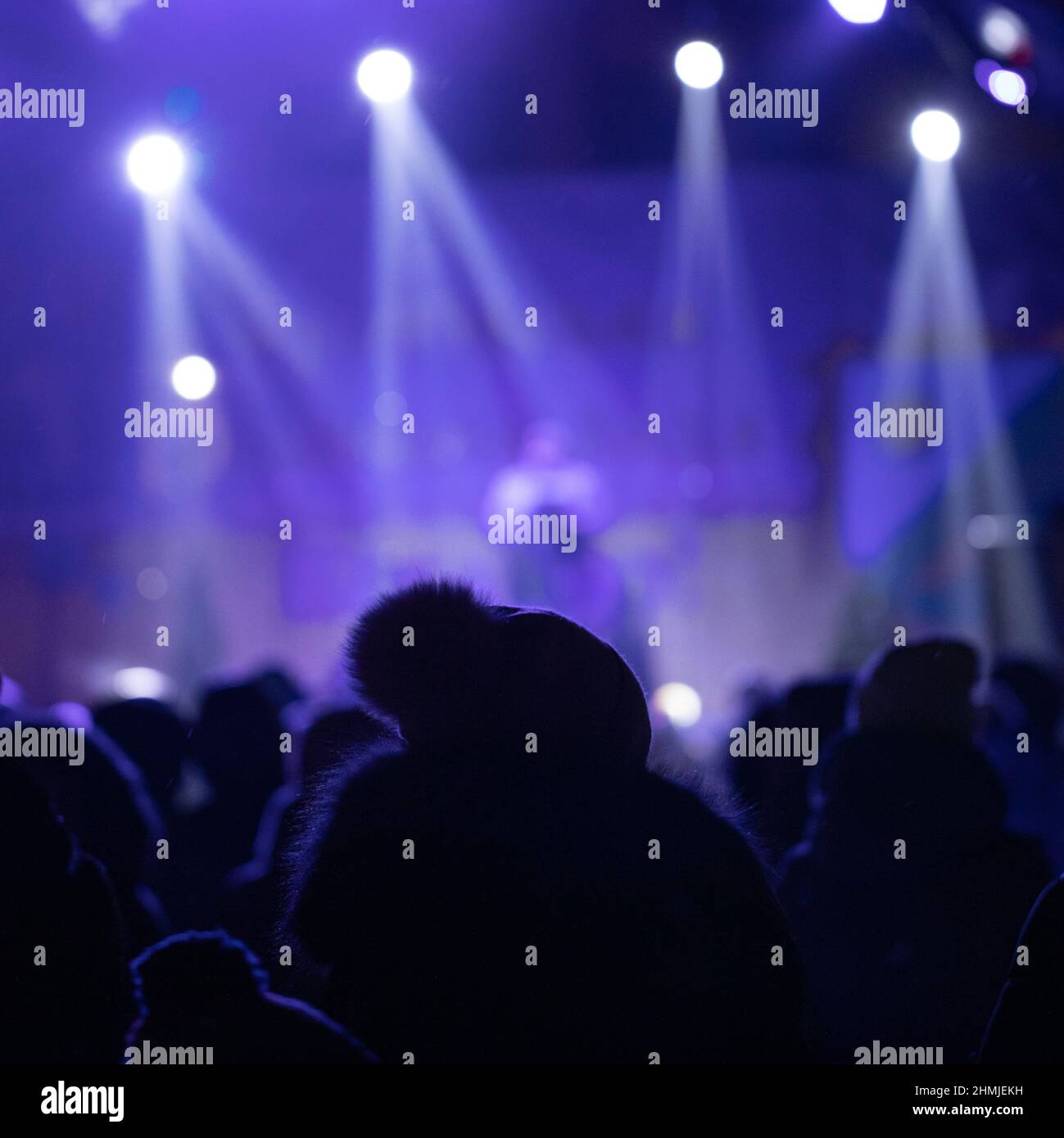 Festival or concert. Large crowds of people. Special effects and light ...