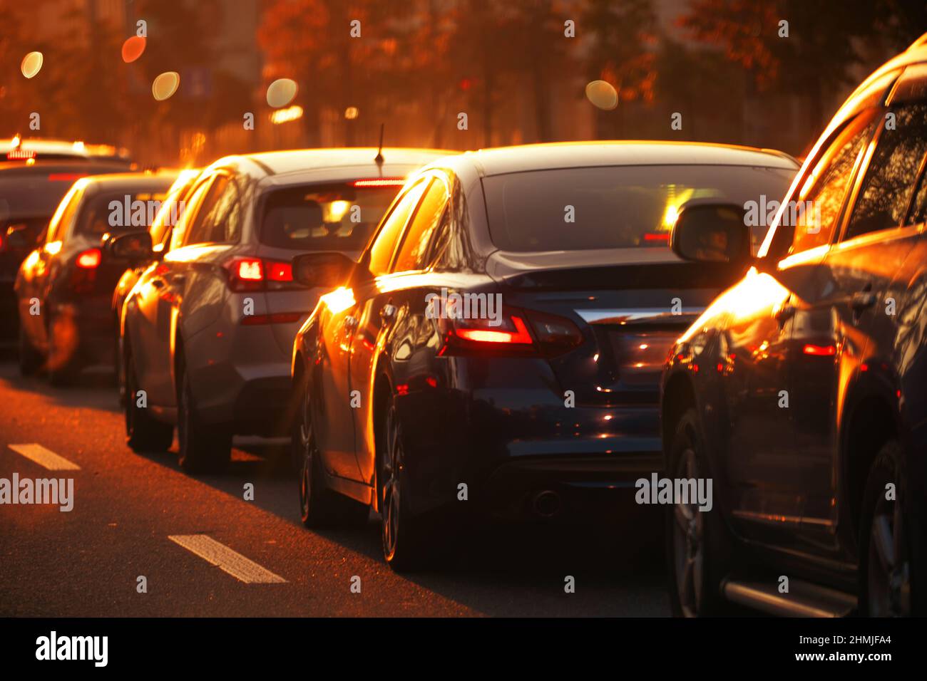 Traffic jam at sunset. Paralyzed traffic on city streets. Selective ...