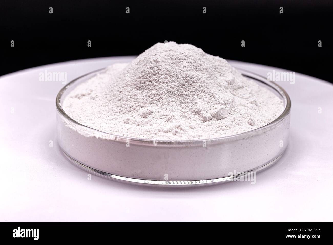 Tin dioxide in a petri dish, is the inorganic compound with the formula ...